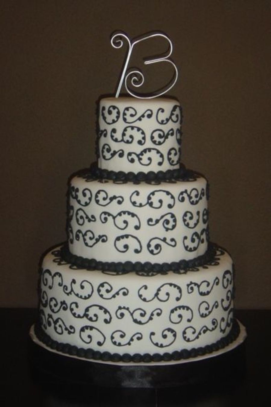White Fondant With Black Scrolls - CakeCentral.com