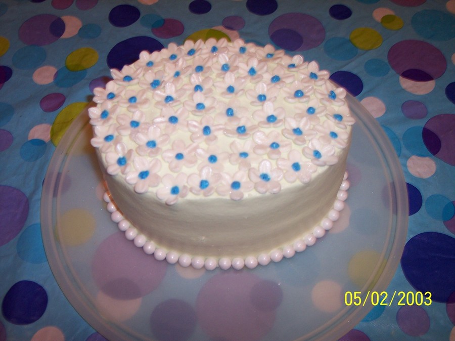 Oval Cake With Fondant Flowers - CakeCentral.com