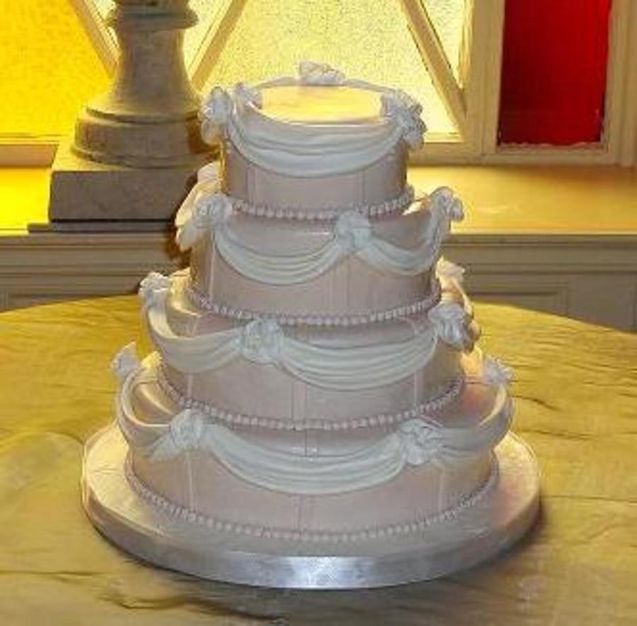 Cappuccino Swags Wedding Cake - CakeCentral.com