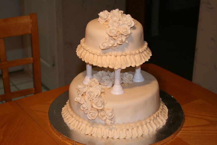 Ivory Fondant Wedding Cake With Fondant Roses - CakeCentral.com