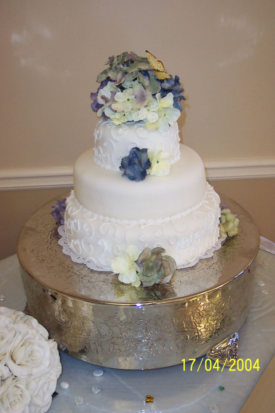White Wedding Cake With Blue Hydrangeas - CakeCentral.com