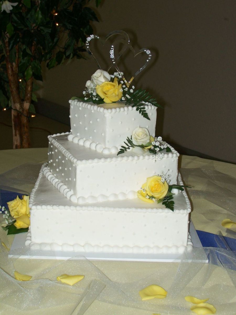 Staggered Square Polka-Dotted Wedding Cake - CakeCentral.com