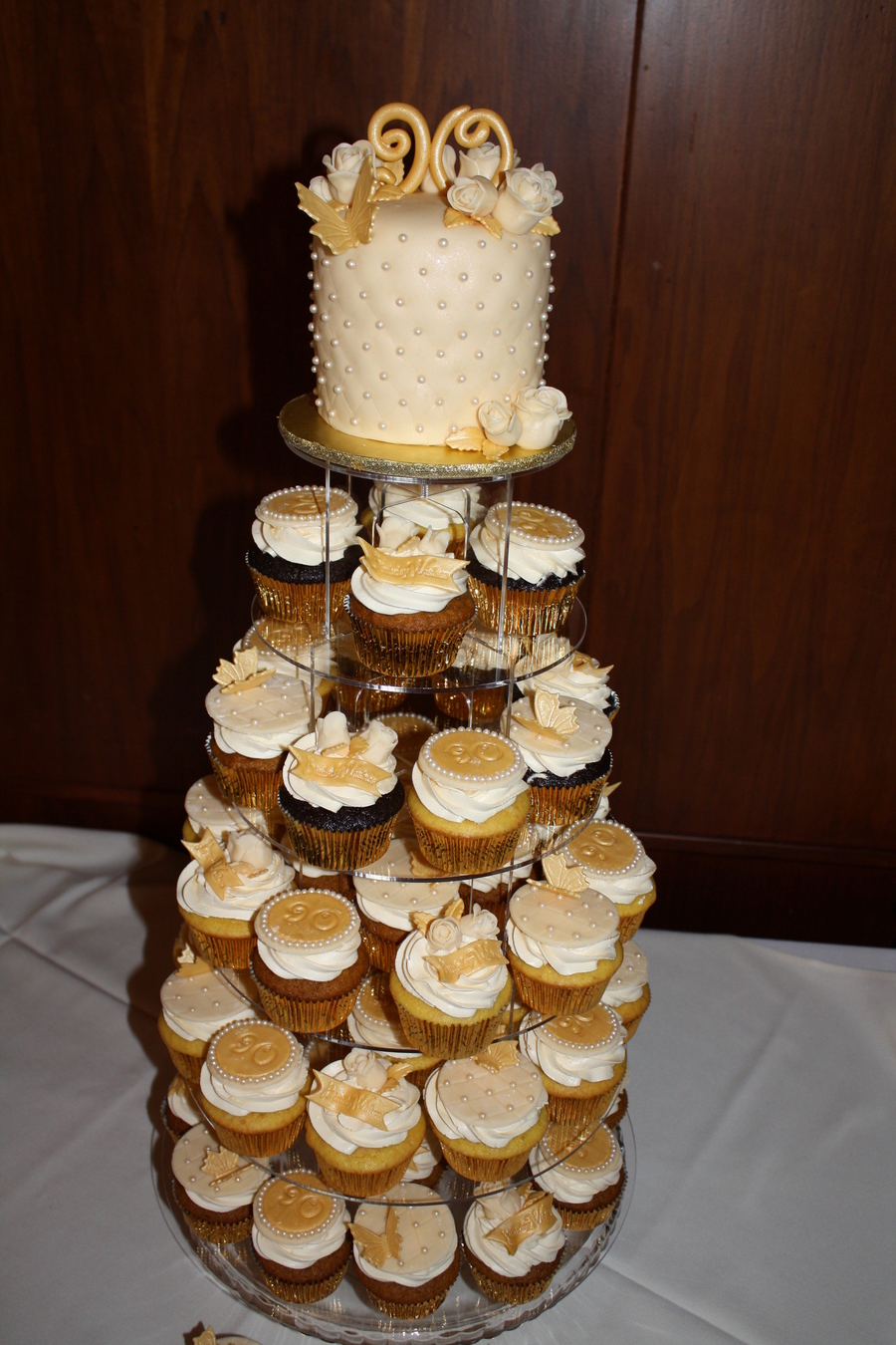 Ivory And Gold Birthday Cupcake Tower - CakeCentral.com