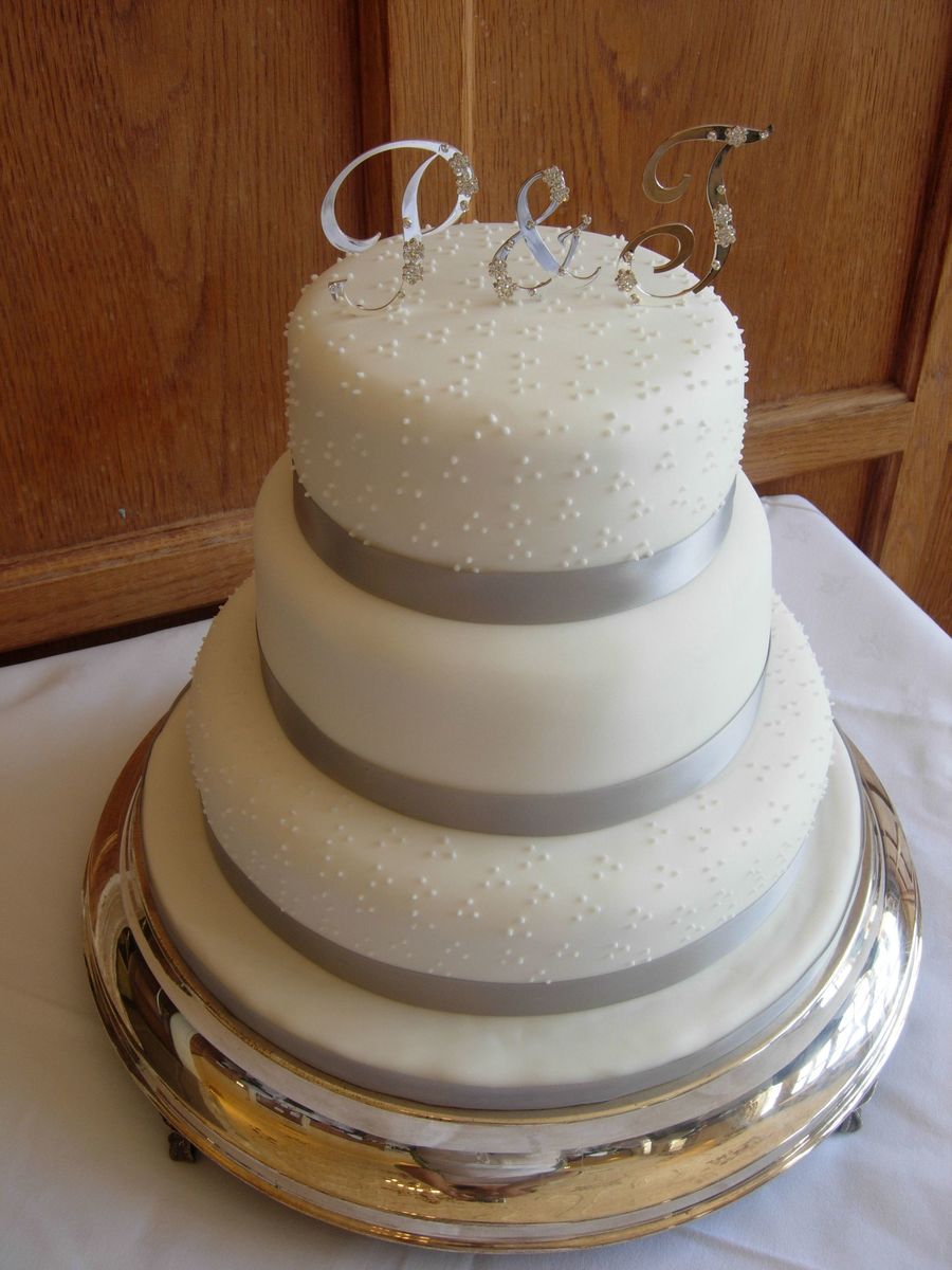 Ditzy Dotty Cake With Monogram - CakeCentral.com