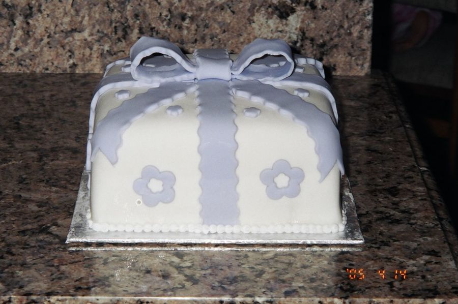 Fondant Present Cake - CakeCentral.com