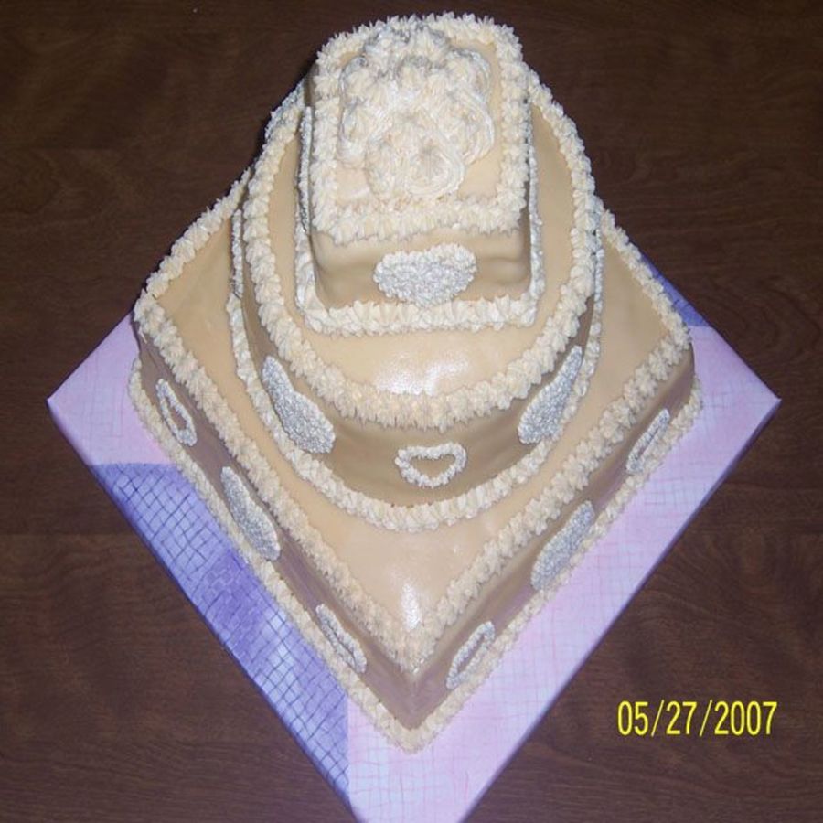 Ivory Wedding Cake - CakeCentral.com