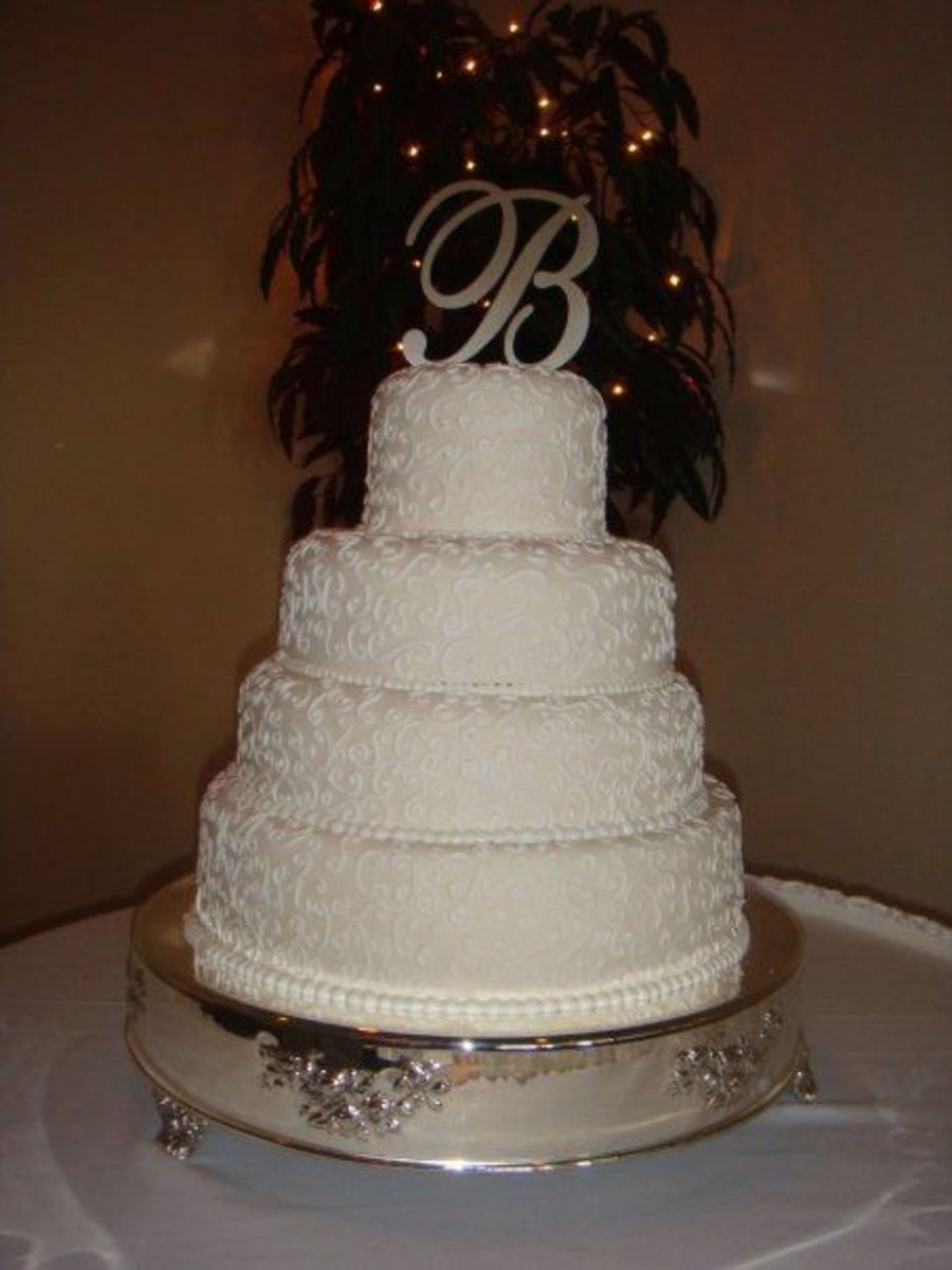 Wedding Cake With Scroll Work - CakeCentral.com