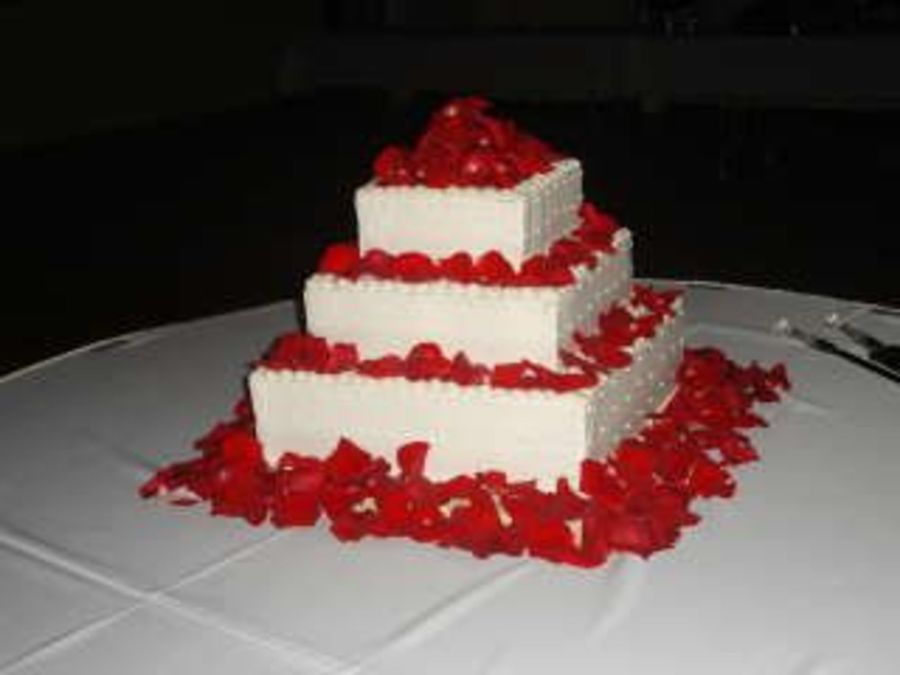 Square Wedding Cake With Lots Of Rose Petals - CakeCentral.com