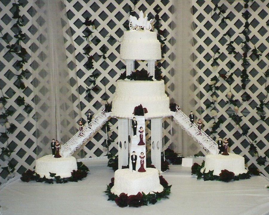 Round Tiered Wedding Cake With Heart Side Cakes - CakeCentral.com