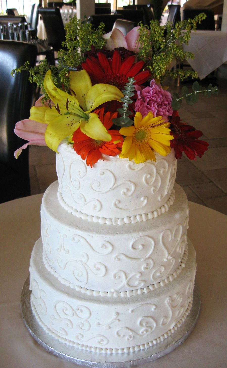 3 Tier Scroll Wedding Cake With Fresh Flowers - CakeCentral.com