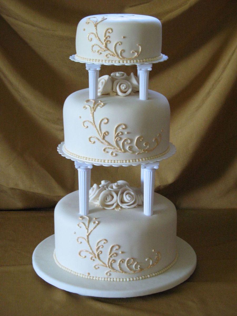 Ivory Fondant With Gold Scrolls - CakeCentral.com