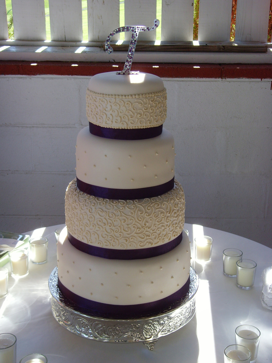 Purple & Cream Wedding Cake - CakeCentral.com