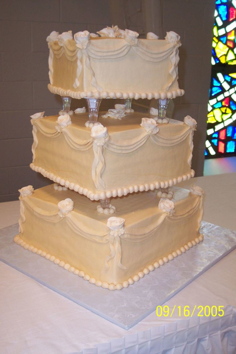 Ivory, Offset Square Tiered Wedding Cake - CakeCentral.com