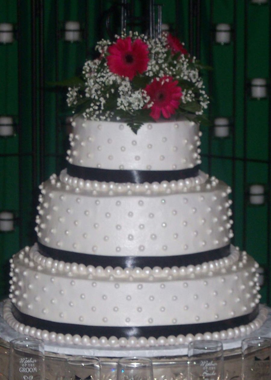Round Wedding Cake With Pearls, Ribbon, Flowers, And Initials - CakeCentral.com