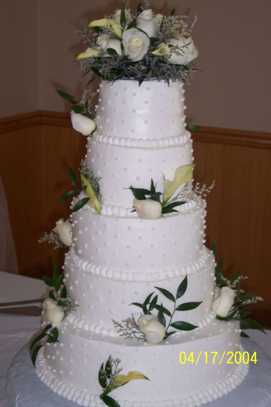 Dotted Swiss Wedding Cake, Calla Lillies & White Roses - CakeCentral.com