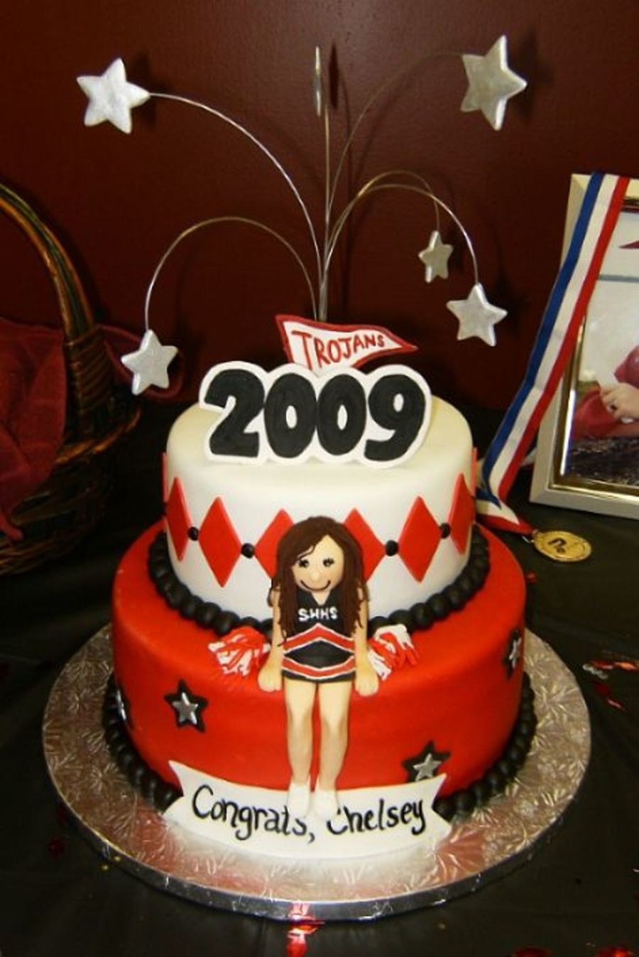 Graduation Cake For A Cheerleader - CakeCentral.com