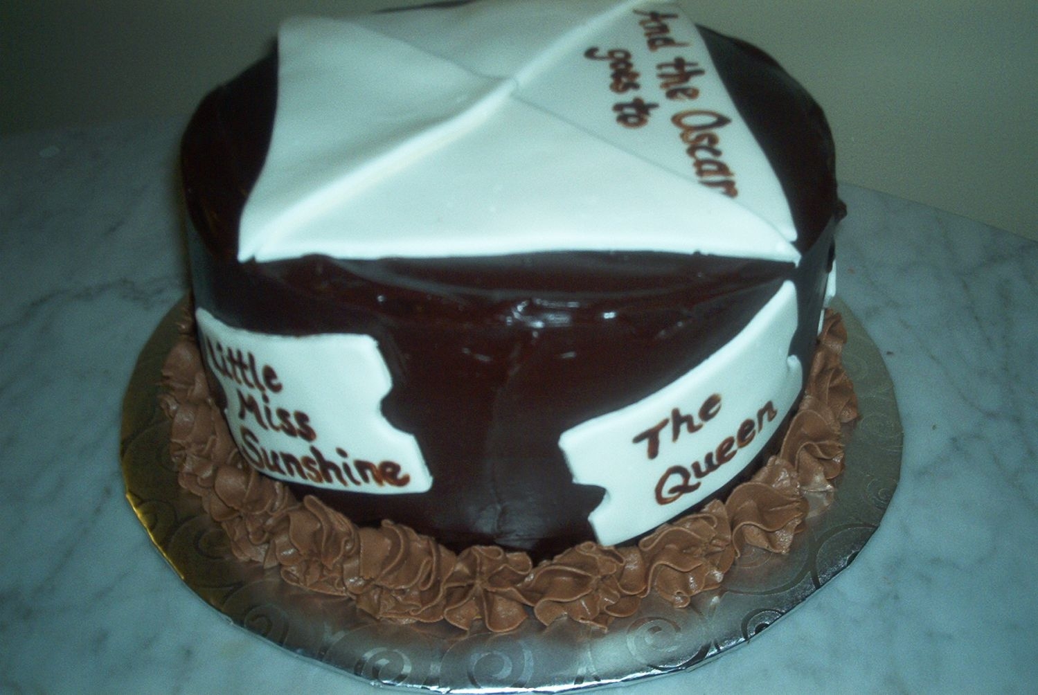 Oscar Cake (Side View) - CakeCentral.com