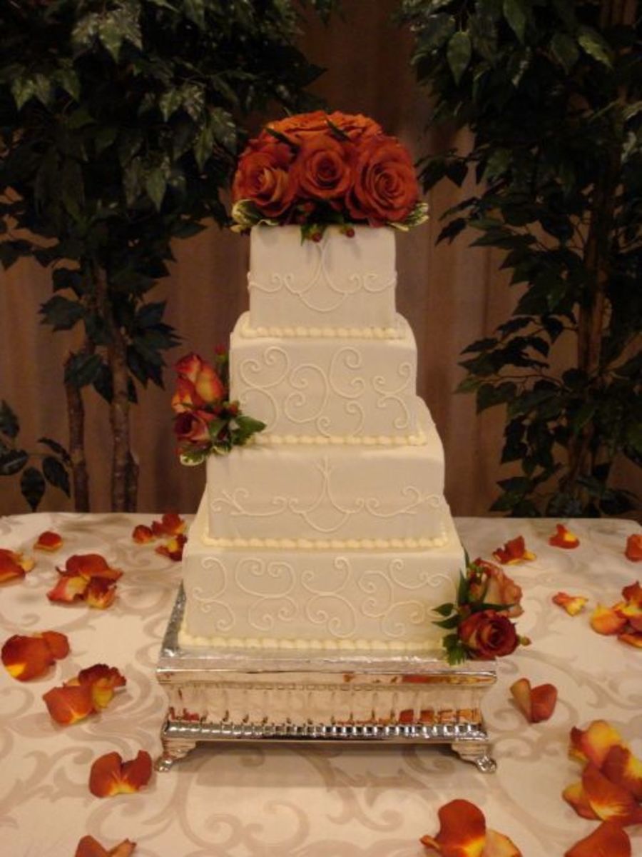 4 Tiered Wedding Cake With Scrolling - CakeCentral.com