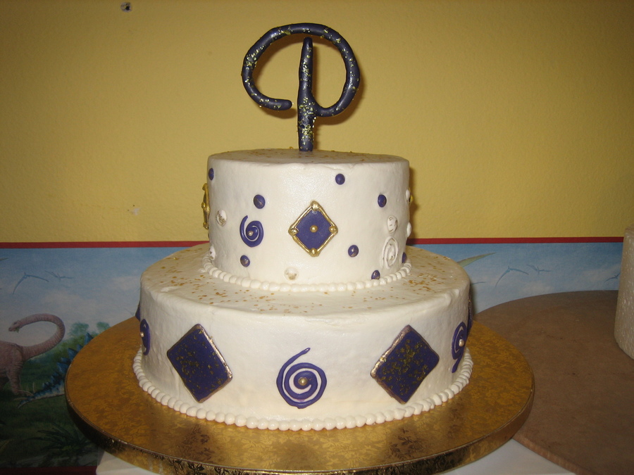 Tiered Purple And Gold Cake With Monogram - CakeCentral.com
