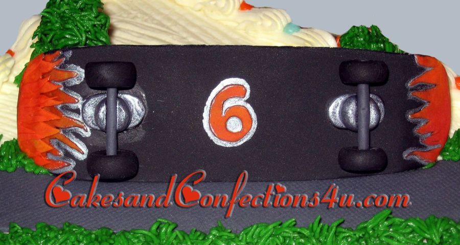 Close-Up Of Skateboard On Themed Sheet Cake - CakeCentral.com