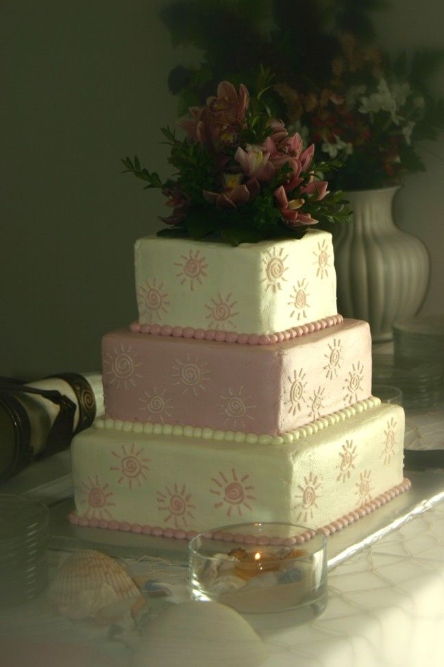 Mauve & Ivory Swirly Suns - CakeCentral.com