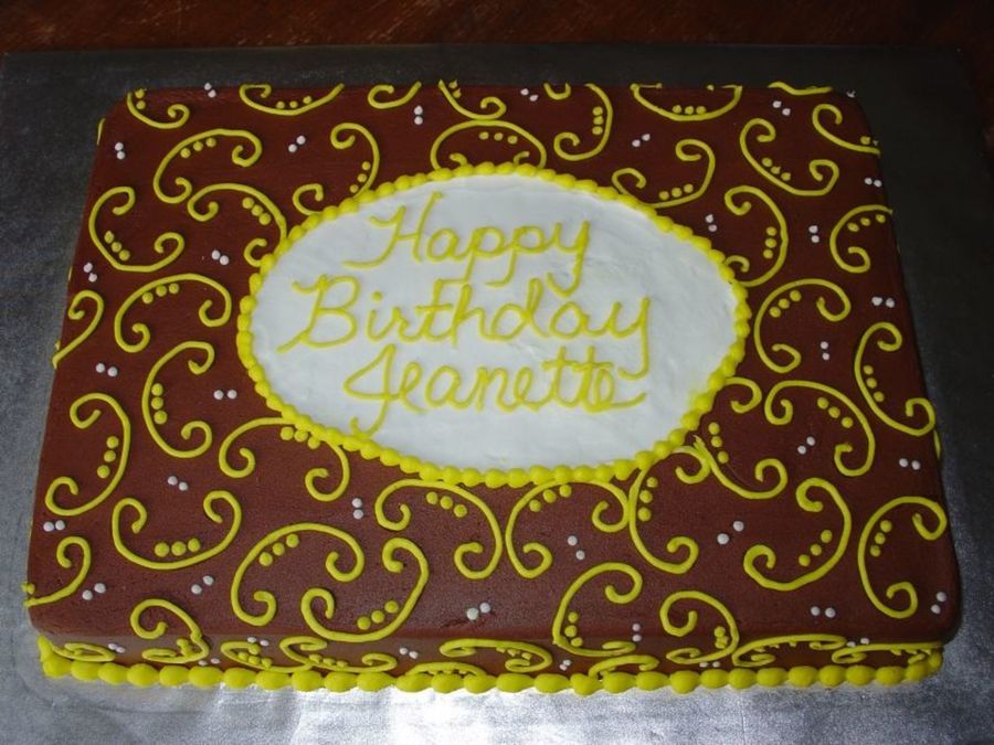 Chocolate With Yellow Scrolls - CakeCentral.com