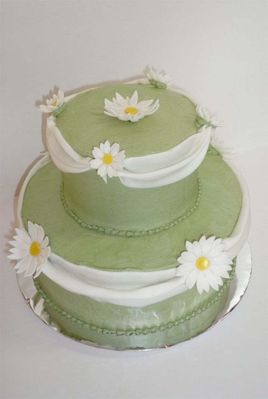 Stacked Daisy Swag Cake - CakeCentral.com