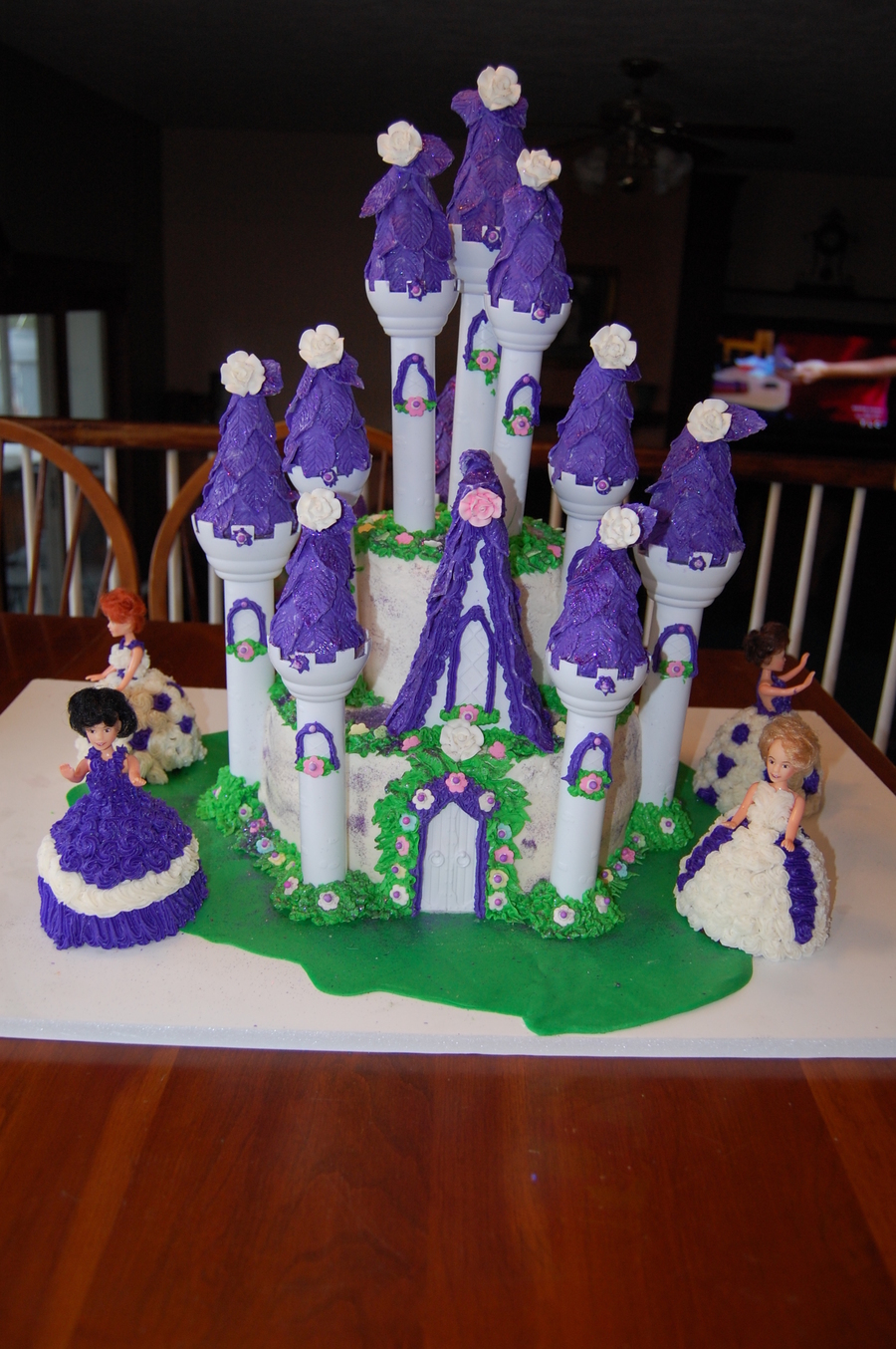 Purple Castle With Leaf Toppers - CakeCentral.com