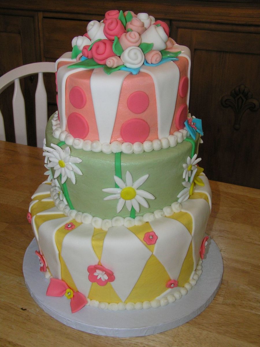 Whimsical Graduation Cake - CakeCentral.com