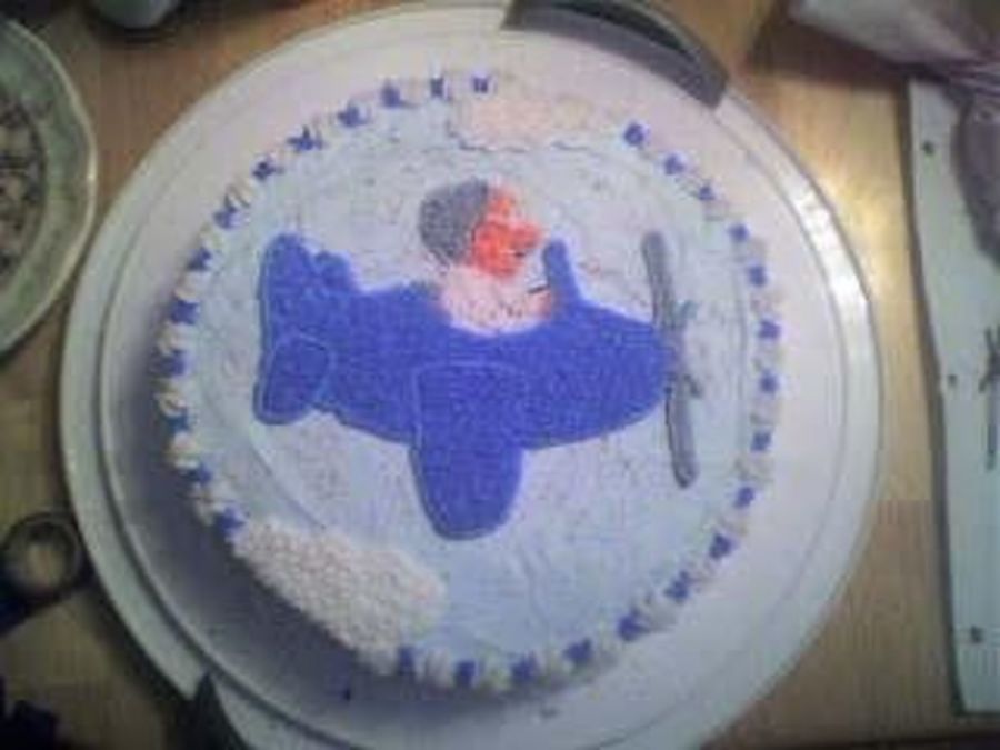 Old Man Flying Plane - CakeCentral.com