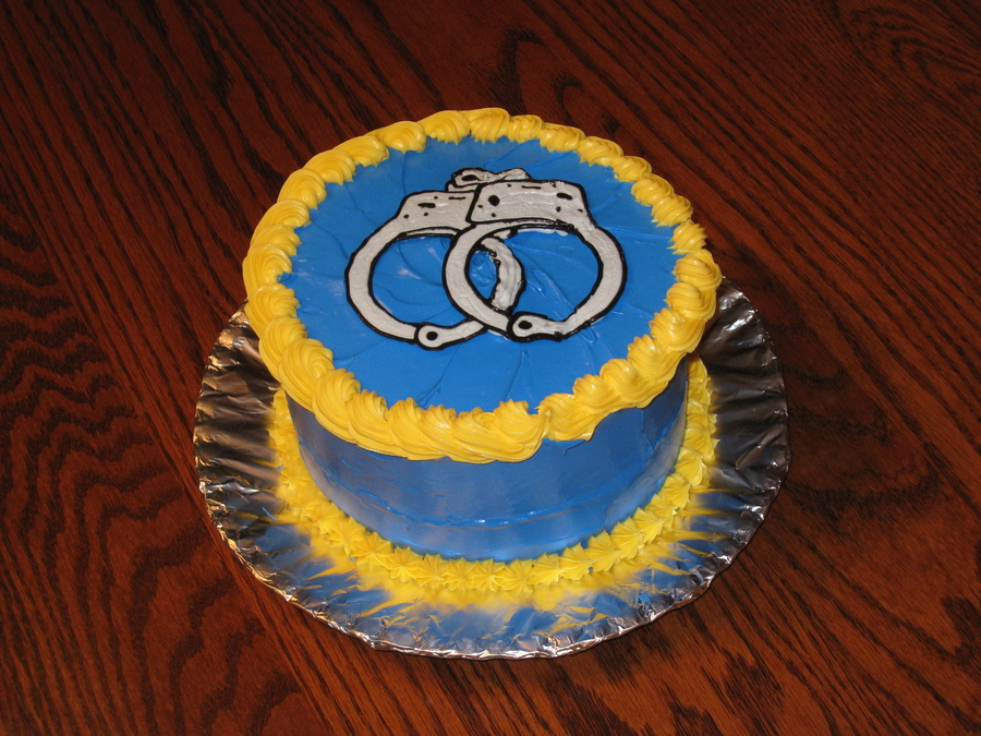 Handcuffs On A Cake - CakeCentral.com