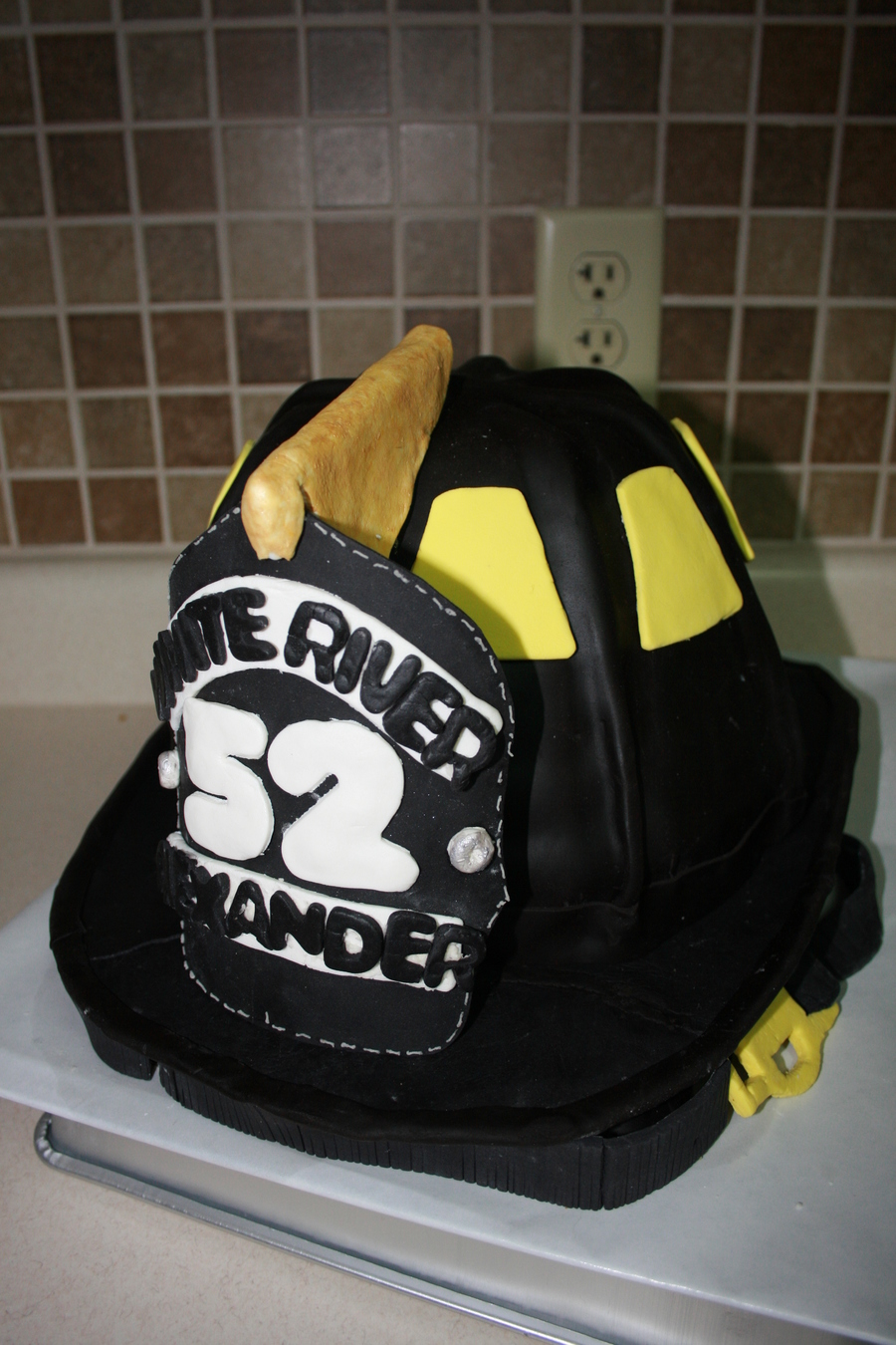Fire Helmet Cake - CakeCentral.com