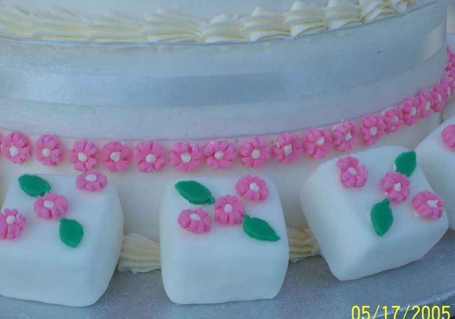 Petifores Used As An Accent On Wedding Cake - CakeCentral.com