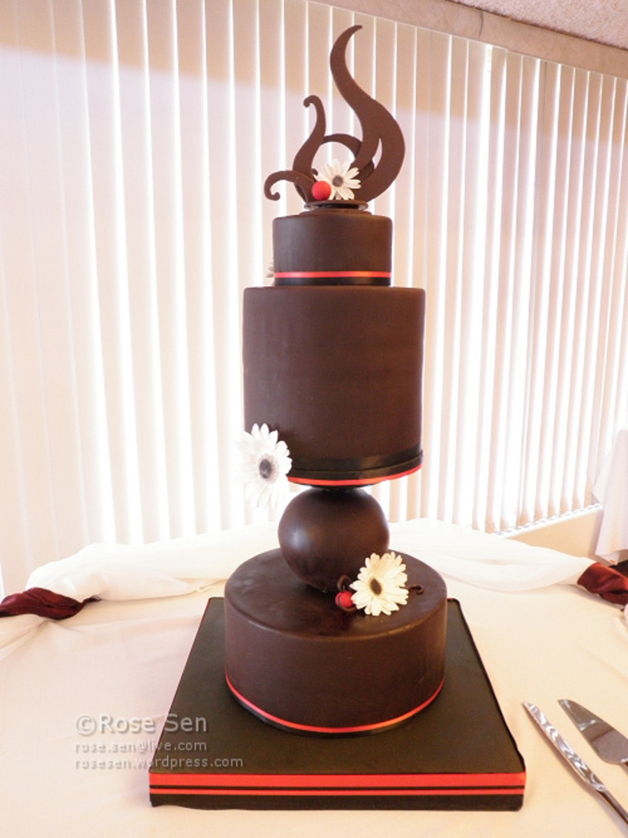 Modern Geometric Dark Chocolate Wedding Cake - CakeCentral.com