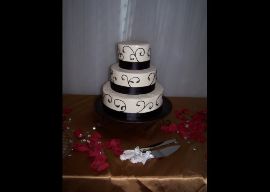 Black Scrolls Wedding Cake - CakeCentral.com