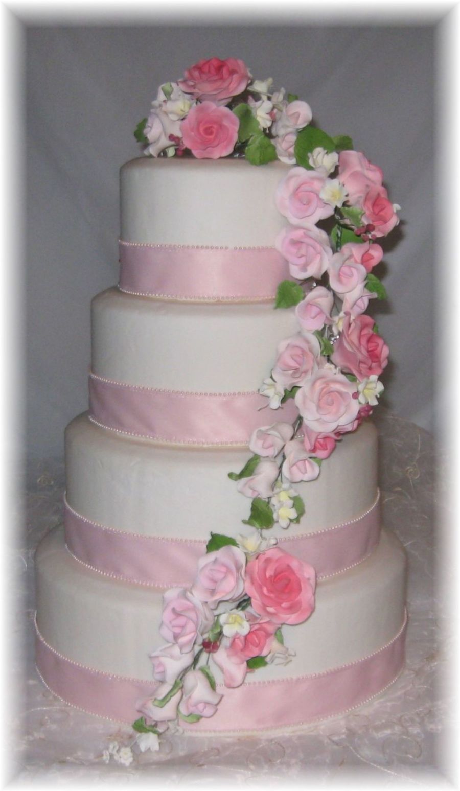 Ribbon & Roses Fondant Wedding Cake - CakeCentral.com