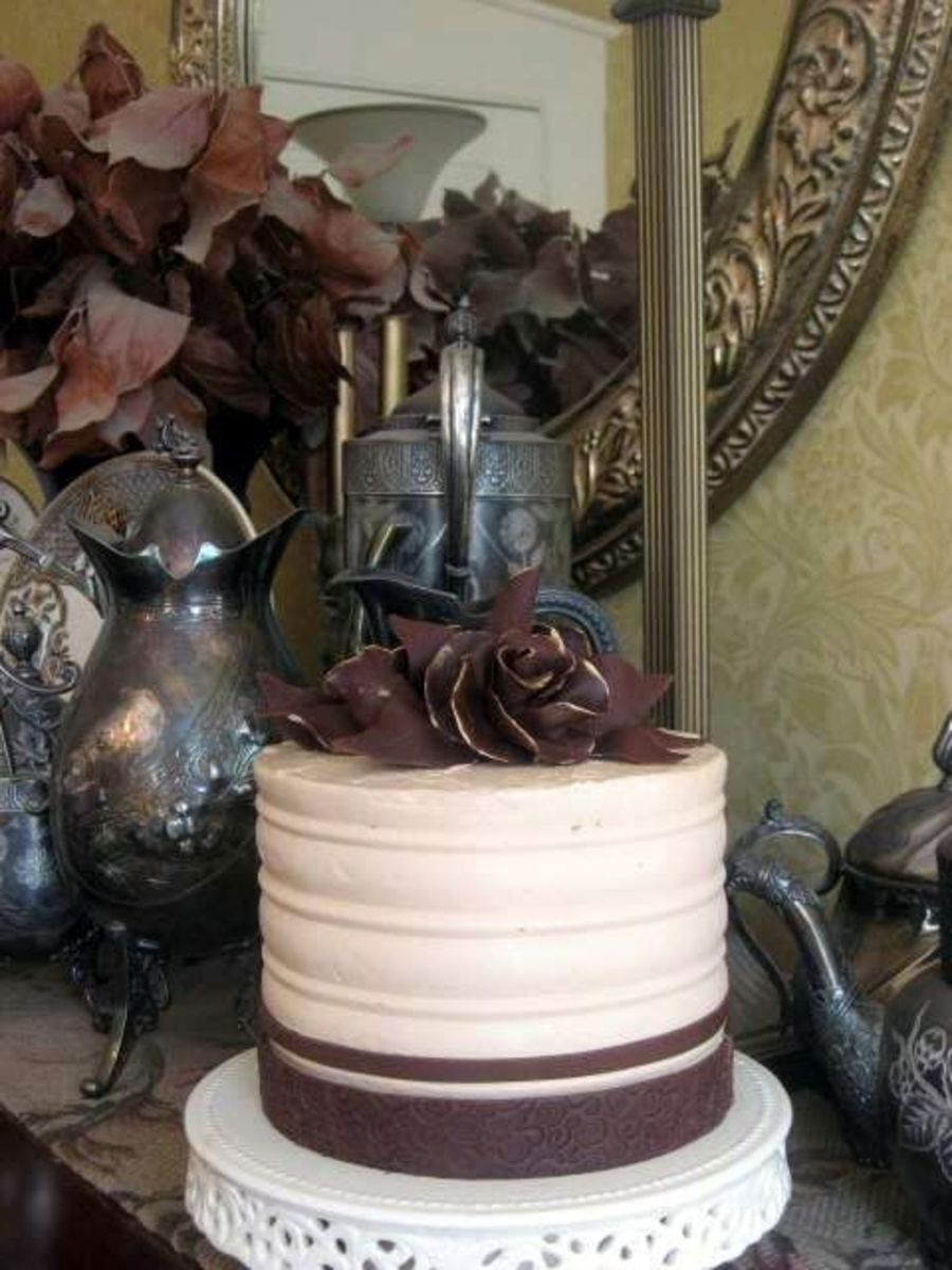 Gilded Chocolate Rosese On Sculpted Icing - CakeCentral.com