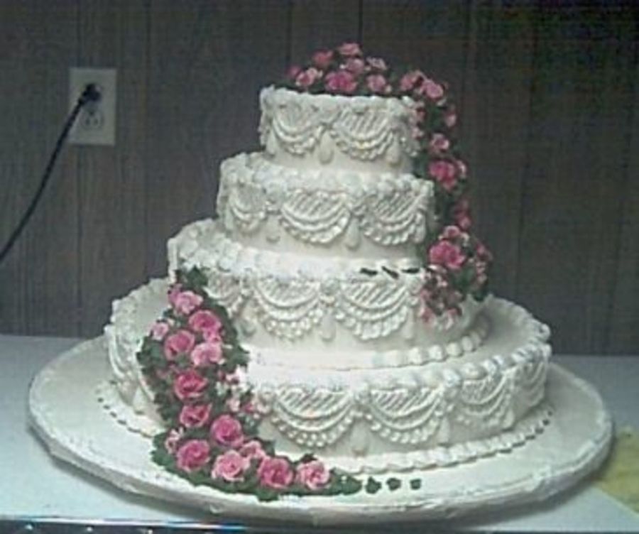 Round Stacked With Rose Cascade - CakeCentral.com