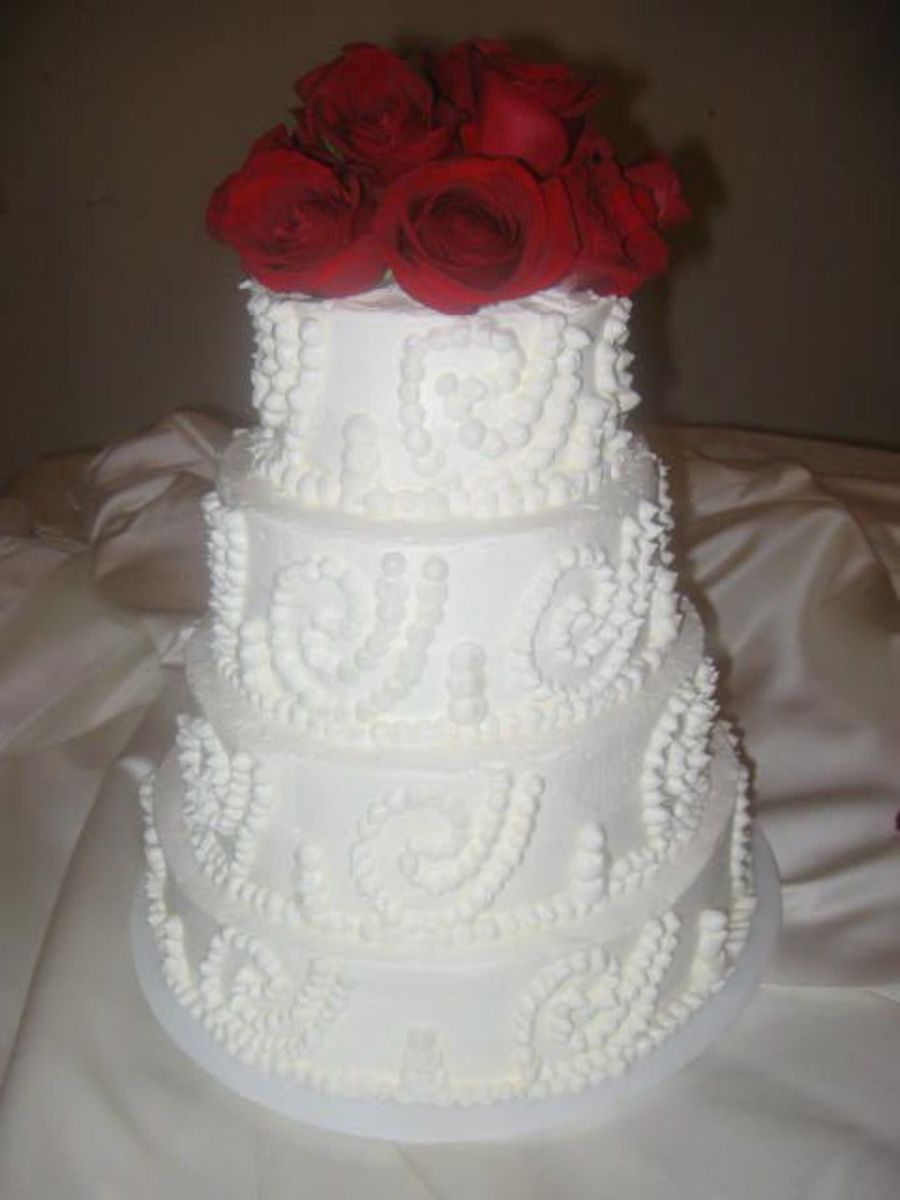 White Scrolls Wedding Cake - CakeCentral.com