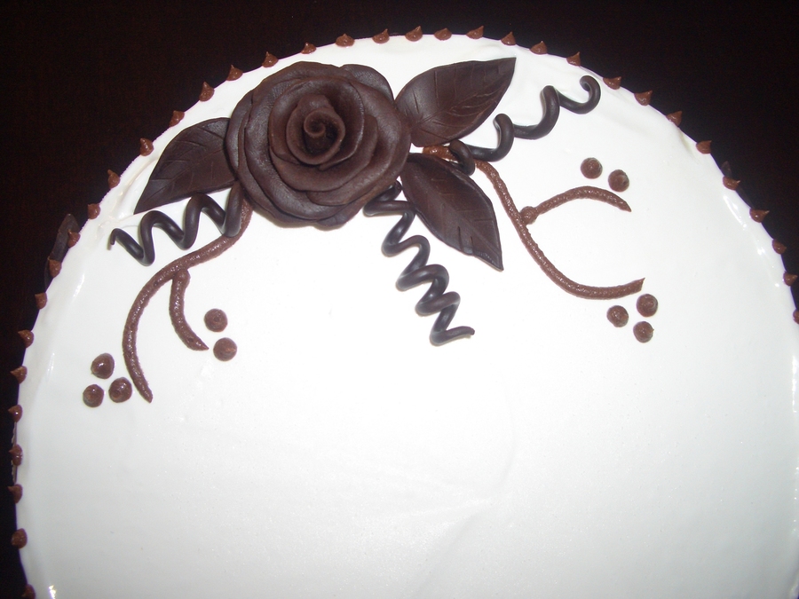 Modeling Chocolate Rose Ice Cream Cake - CakeCentral.com