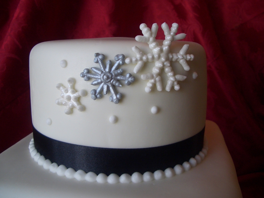 Silver And Pearl Snowflakes - CakeCentral.com