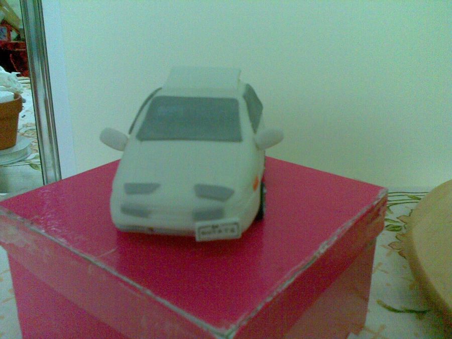 Mazda Rx7 On Rotary Symbol Cake - CakeCentral.com