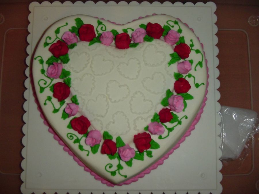 Pink And Red Rosebuds On A Layered Heart - CakeCentral.com