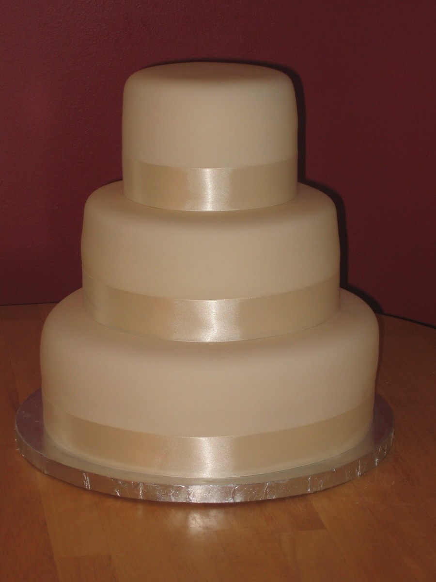 Simple Ivory Wedding Cake - CakeCentral.com