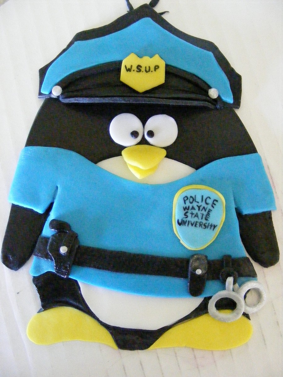 Penguin Cop - CakeCentral.com