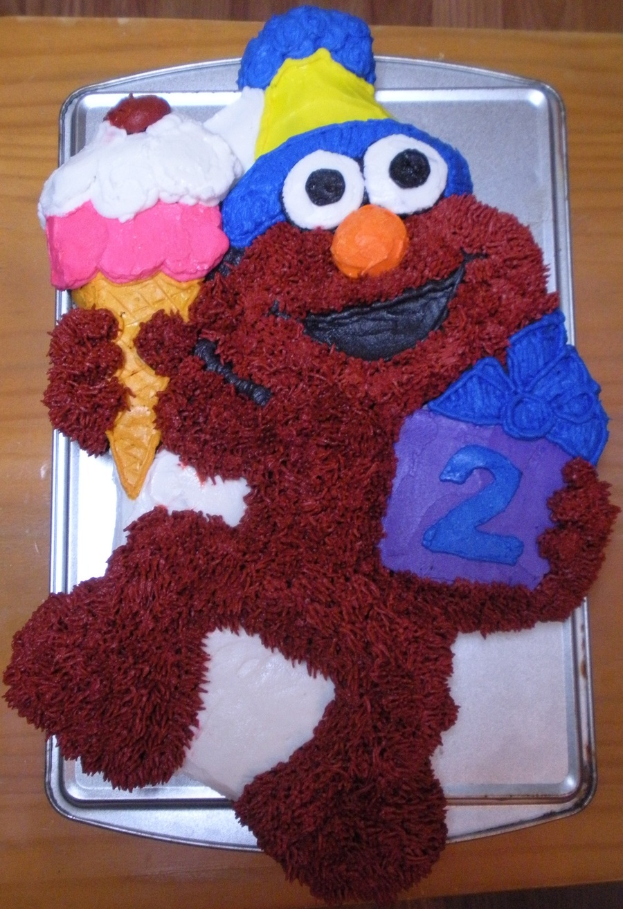 Elmo Cake - Placed On Top Of White Sheet Cake - CakeCentral.com