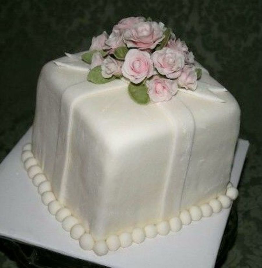 White Fondant Package With Fondant Roses - CakeCentral.com