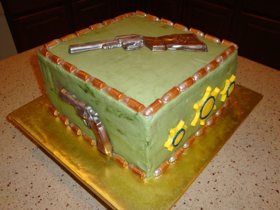 Guns, Bullets, & Badges Cake - CakeCentral.com
