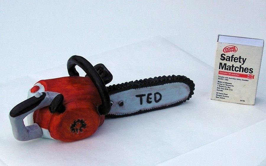 Chainsaw Cake Complete - CakeCentral.com