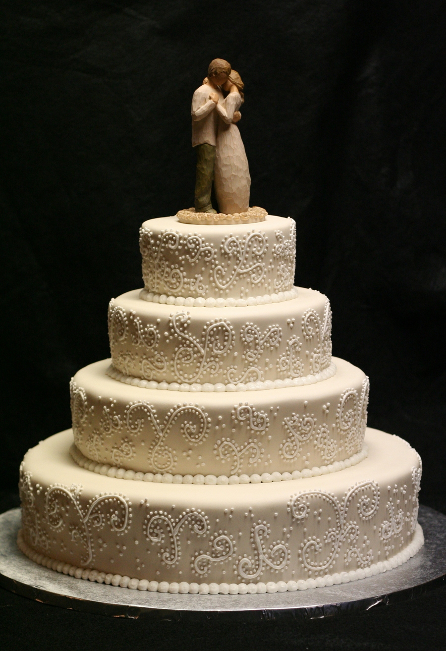 Ivory And White Wedding Cake With Scroll Work - CakeCentral.com
